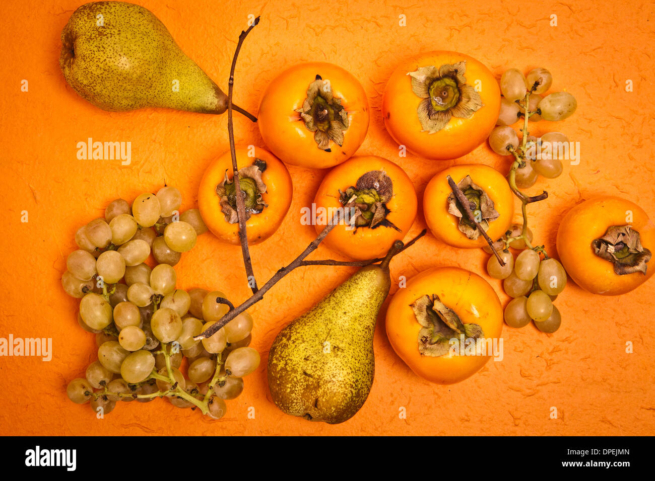 pears,persimmons and grapes Stock Photo - Alamy