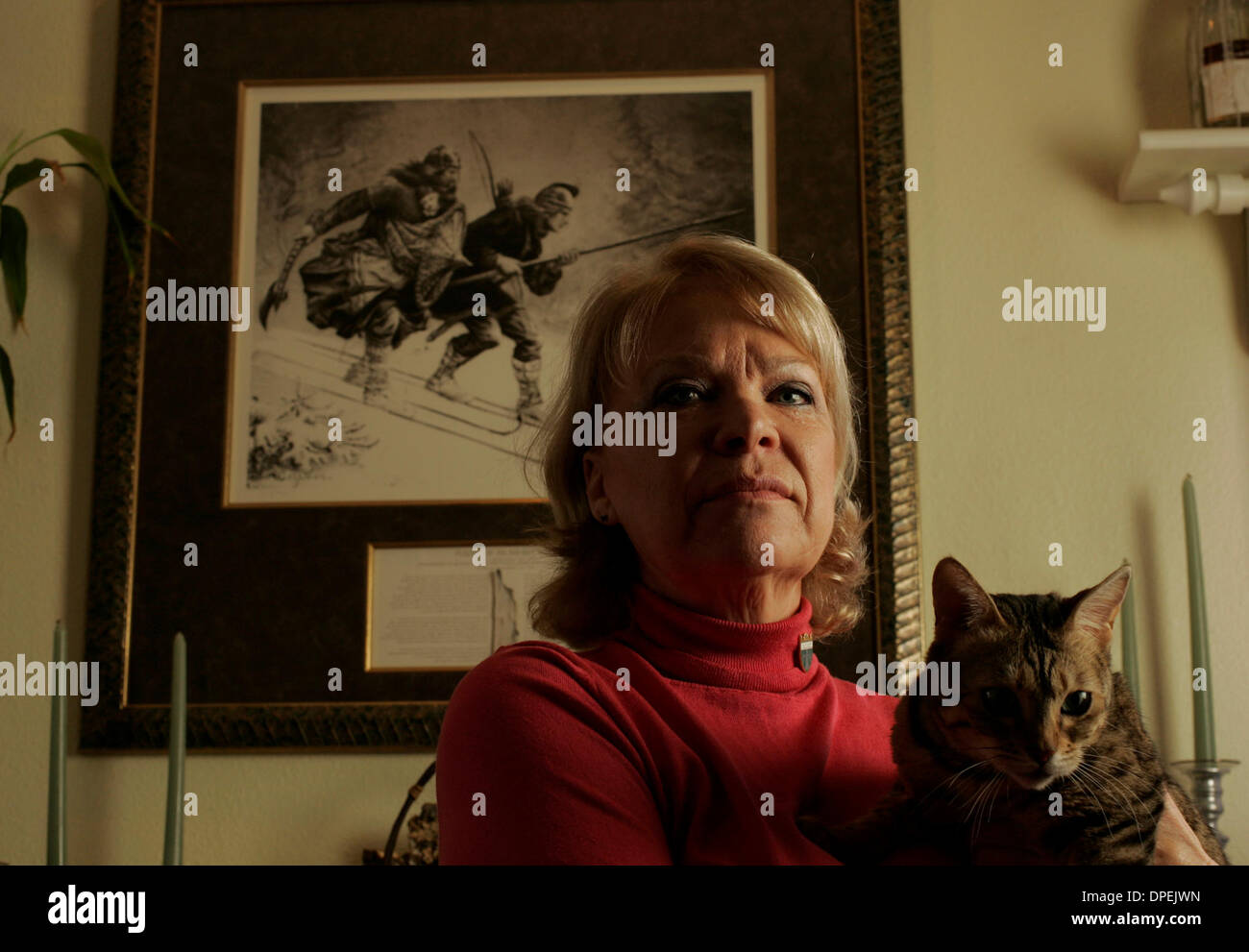 (Published 1/22/2006, E-1) Diane Carlson with her cat Tequila, in her ...
