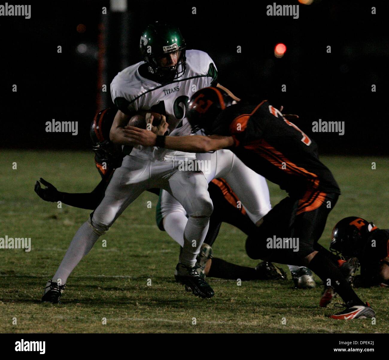 (Published 9/24/2005, D-6:1) Poway #12 Jared Relyea avoids tackle by ...