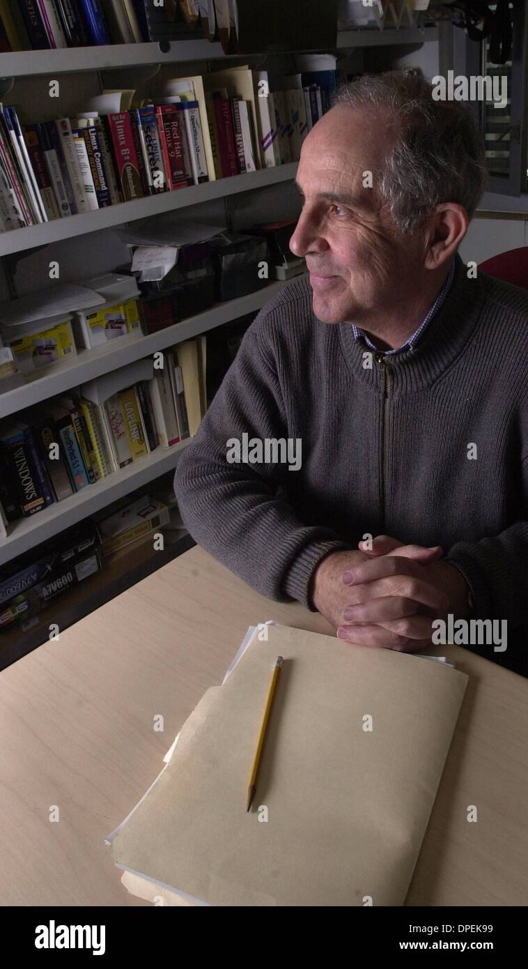 David Phillips, sociologist professor at UCSD, looks for charts in his ...