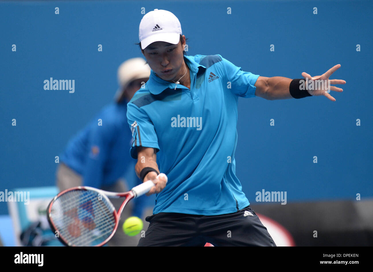 Melbourne, Australia. 14th Jan, 2014. Go Soeda of Japan returns a shot ...