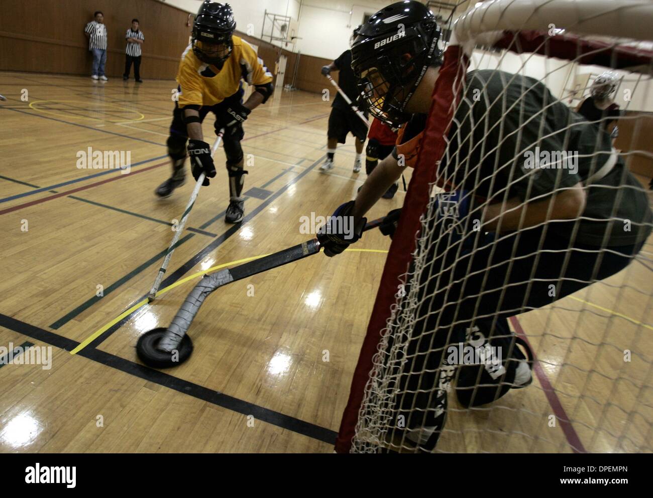 (Published 1/30/2005, E-6) Lightening Bolts goalie Adam Farmer keeps ...