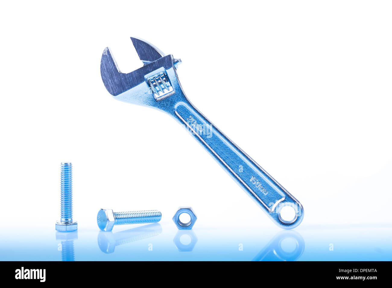 Adjustable wrench with screws on white background Stock Photo - Alamy