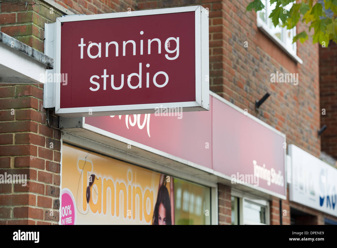 Tanning Studio signage on high street shops in Fareham, Hampshire Stock ...