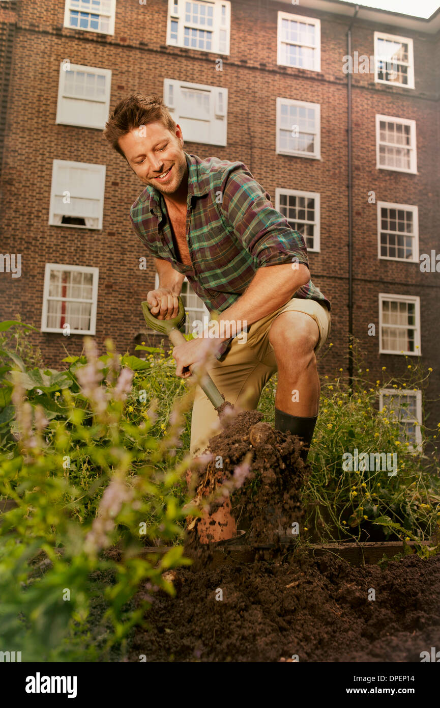 Adult digging hi-res stock photography and images - Alamy