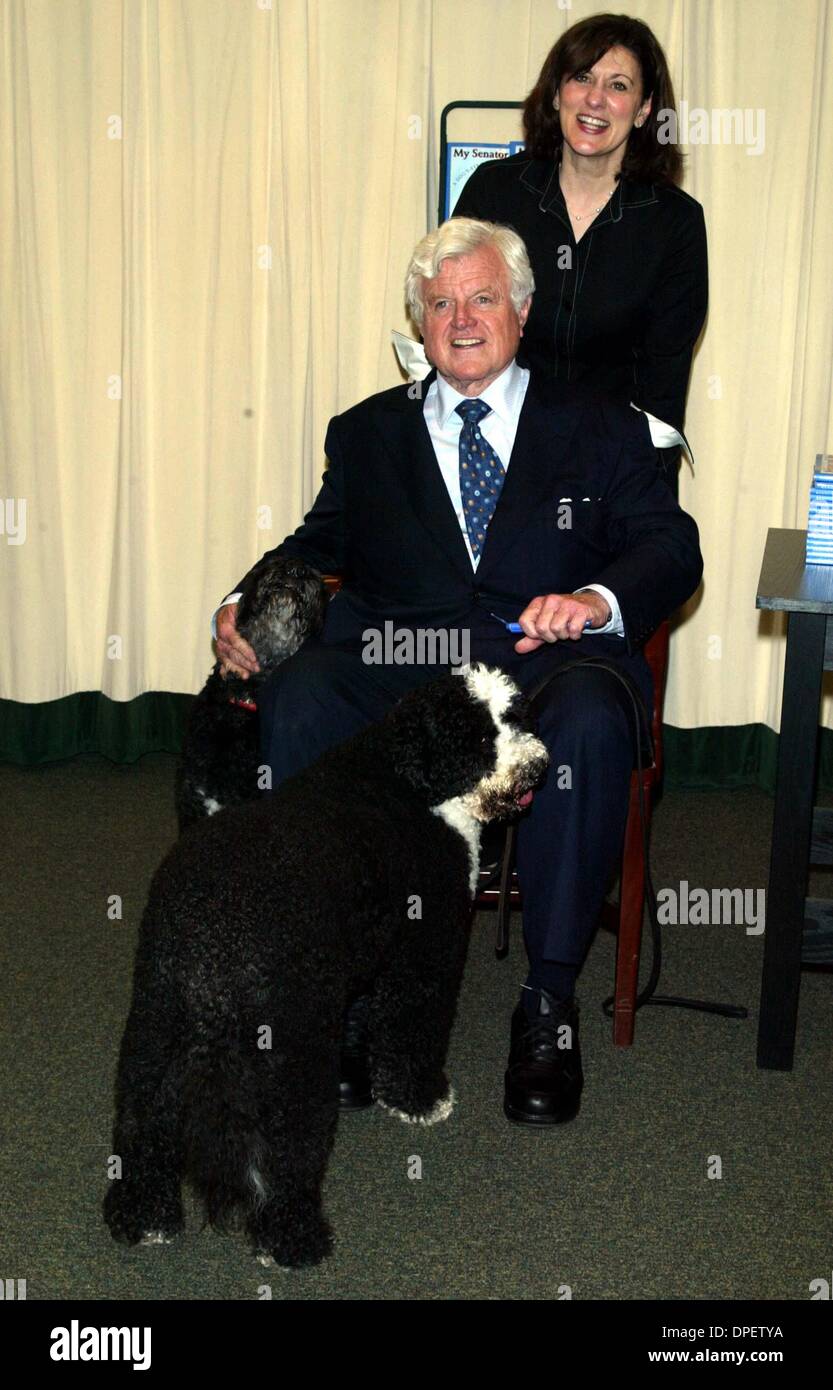 Senator Ted Kennedy (with wife Vickie and dogs Sunny and Splash) signs ...