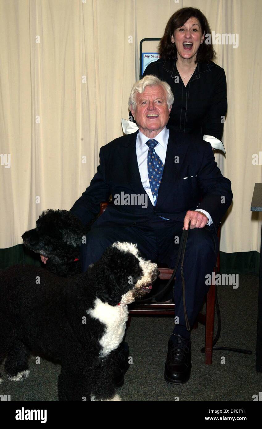 Senator Ted Kennedy (with wife Vickie and dogs Sunny and Splash) signs ...