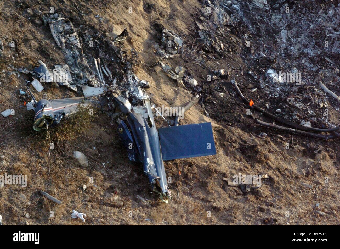 Dec 11, 2006 - Devore, California, U.S. - Twisted and charred metal and ...