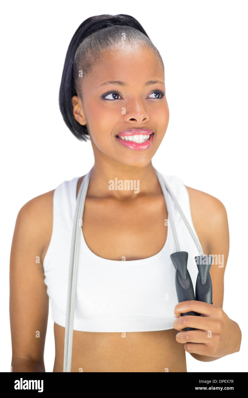 Cheerful natural model holding jump rope Stock Photo - Alamy