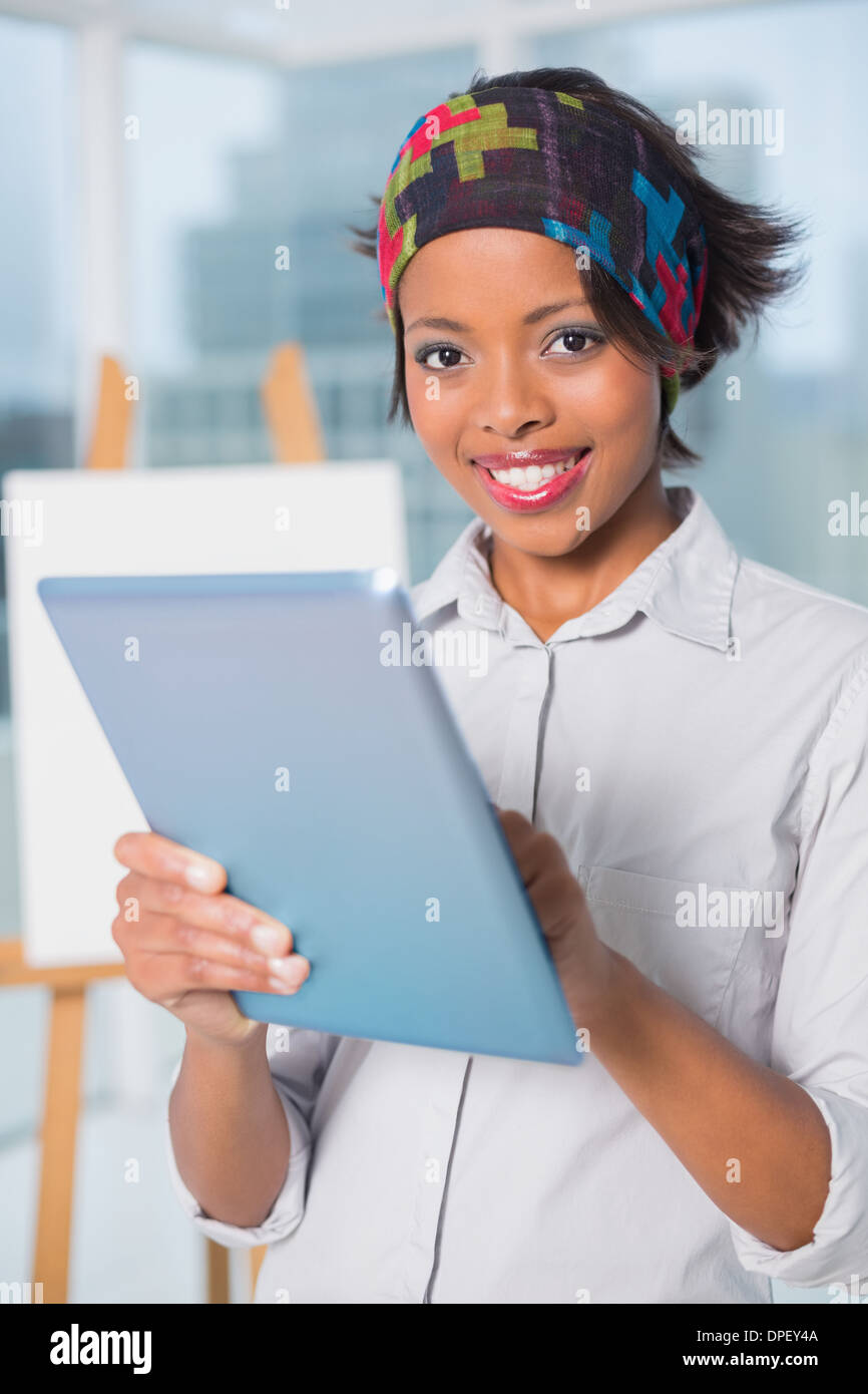 Happy artist using tablet Stock Photo - Alamy