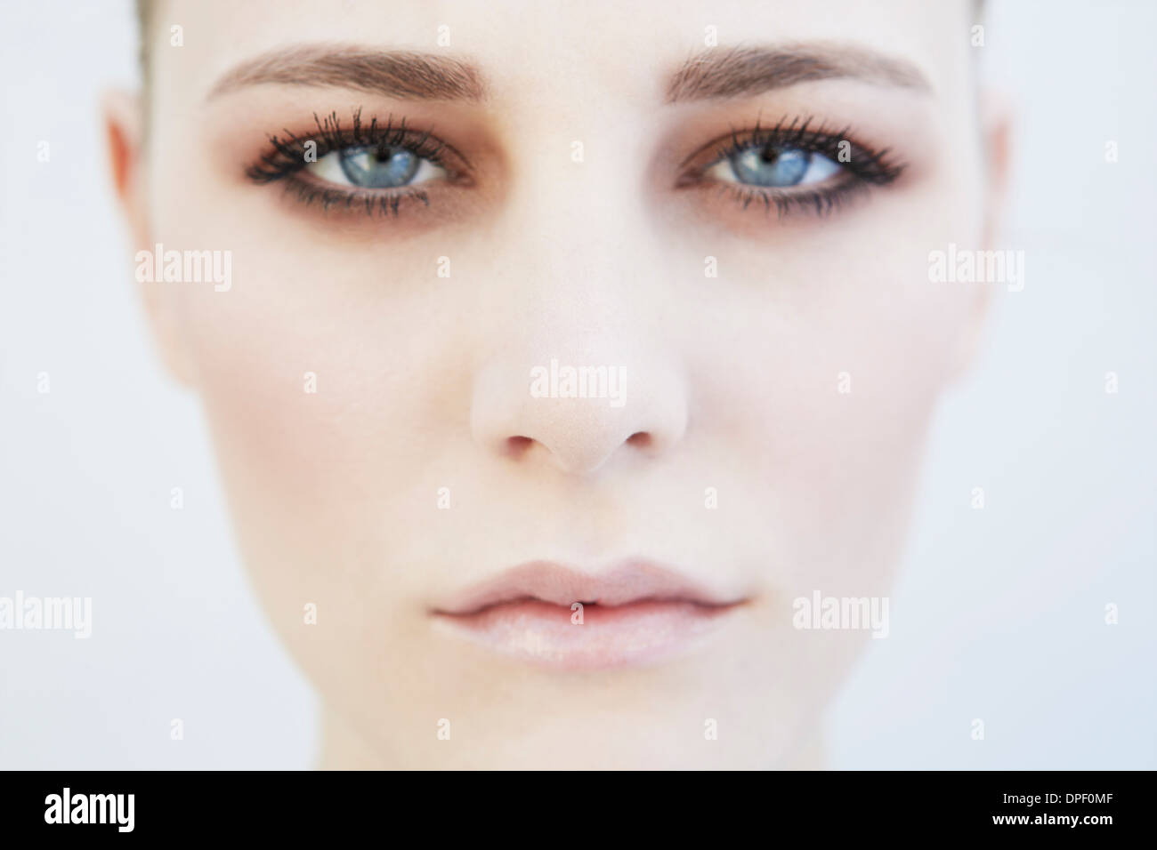 Close up studio head shot of beautiful young woman Stock Photo - Alamy