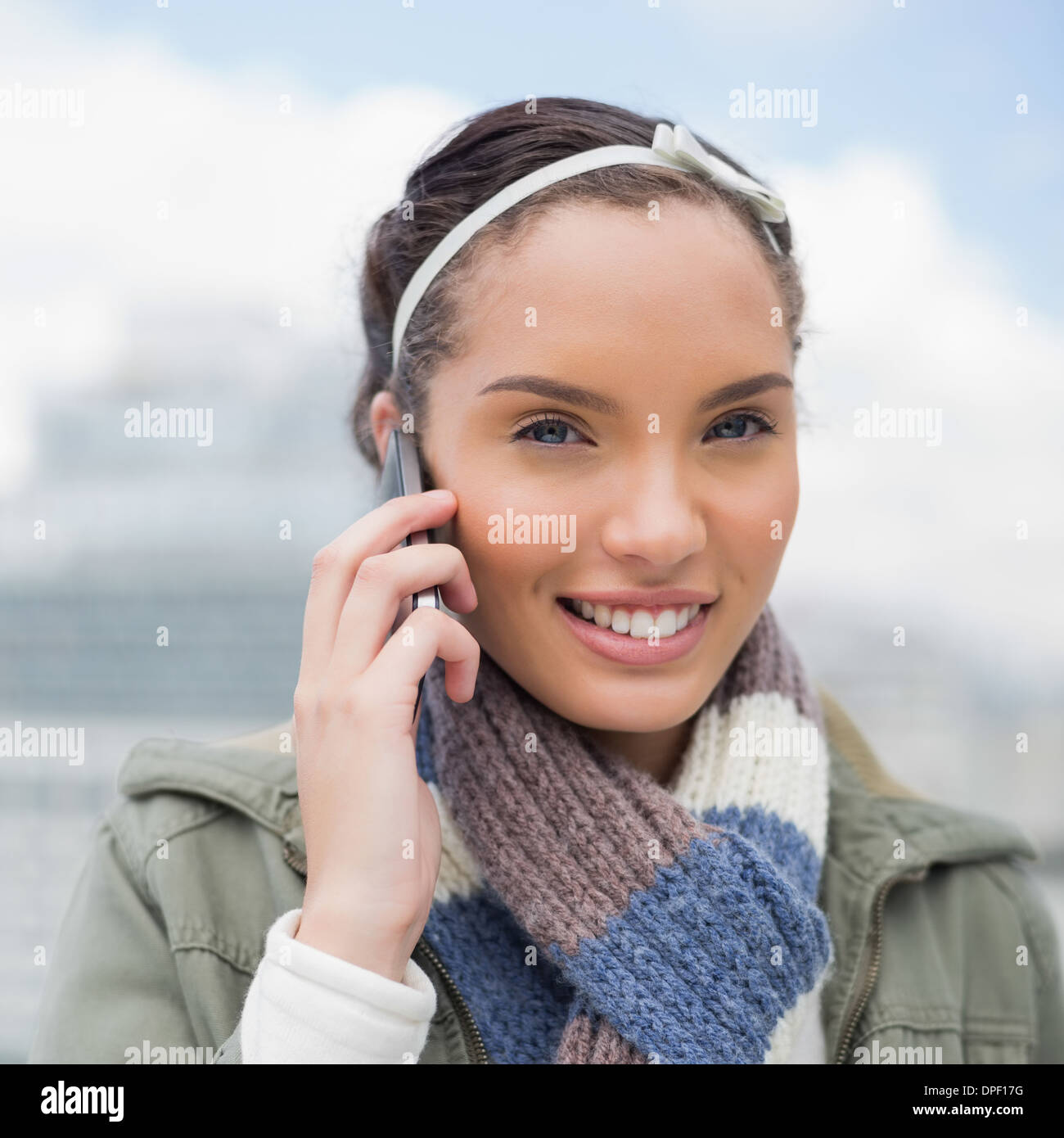 Close up view of attractive woman talking on phone Stock Photo - Alamy