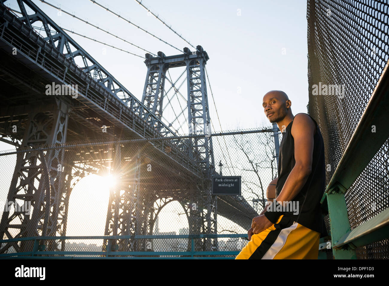 Man leaning against fence hi-res stock photography and images - Alamy