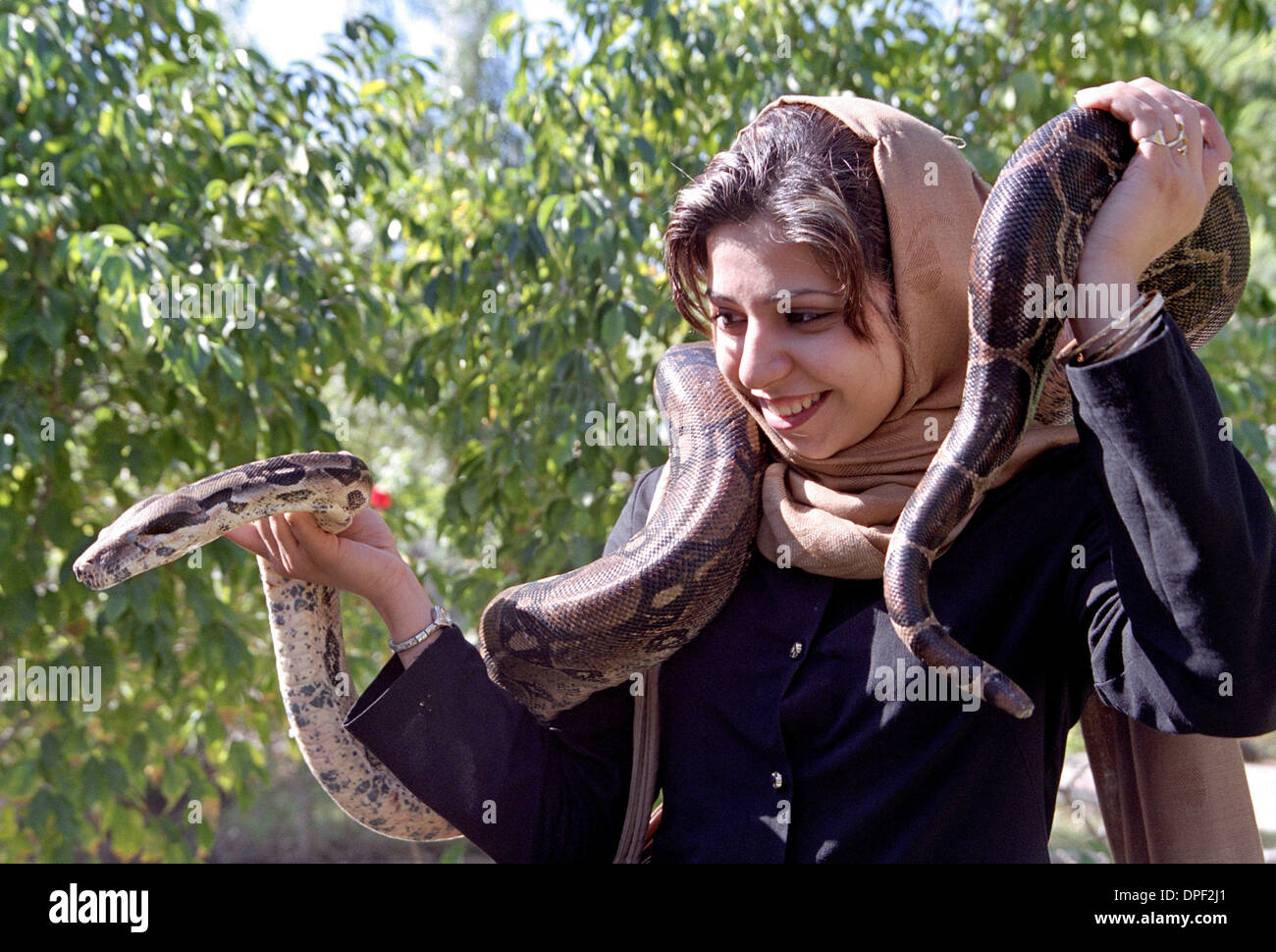 Sep 21, 2006 - Island of Kish, Iran - Iranian woman snake tamer on the ...