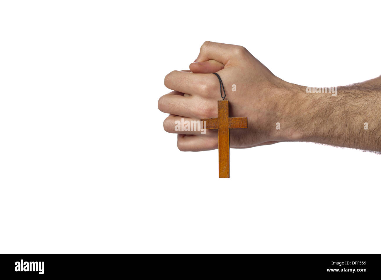Male hands holding wooden cross on white background Stock Photo - Alamy
