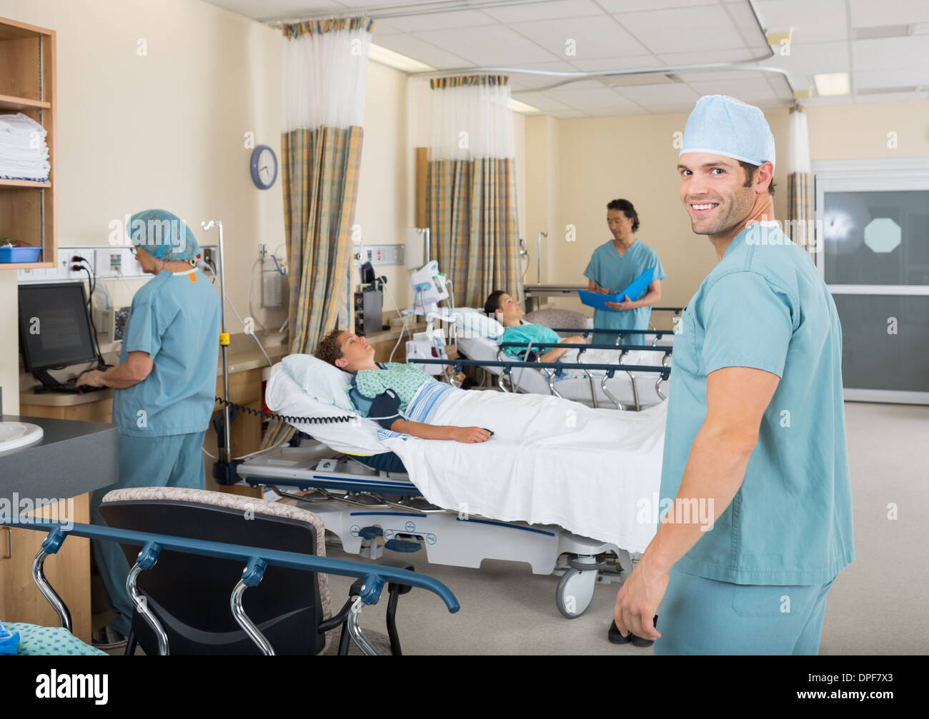 Male Nurse Standing In Hospital PAR unit Stock Photo - Alamy
