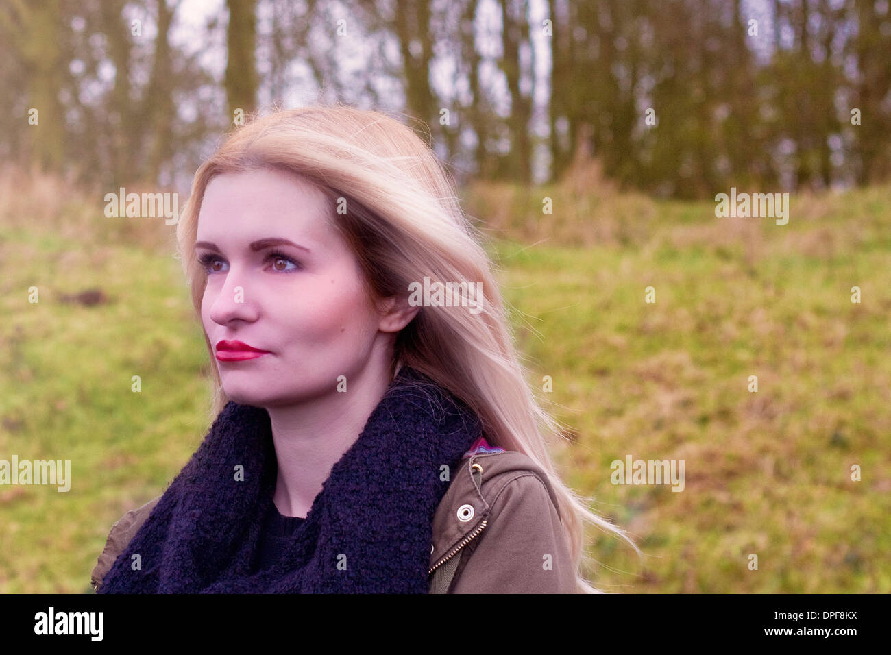 Portrait of sad young woman outdoors Stock Photo - Alamy