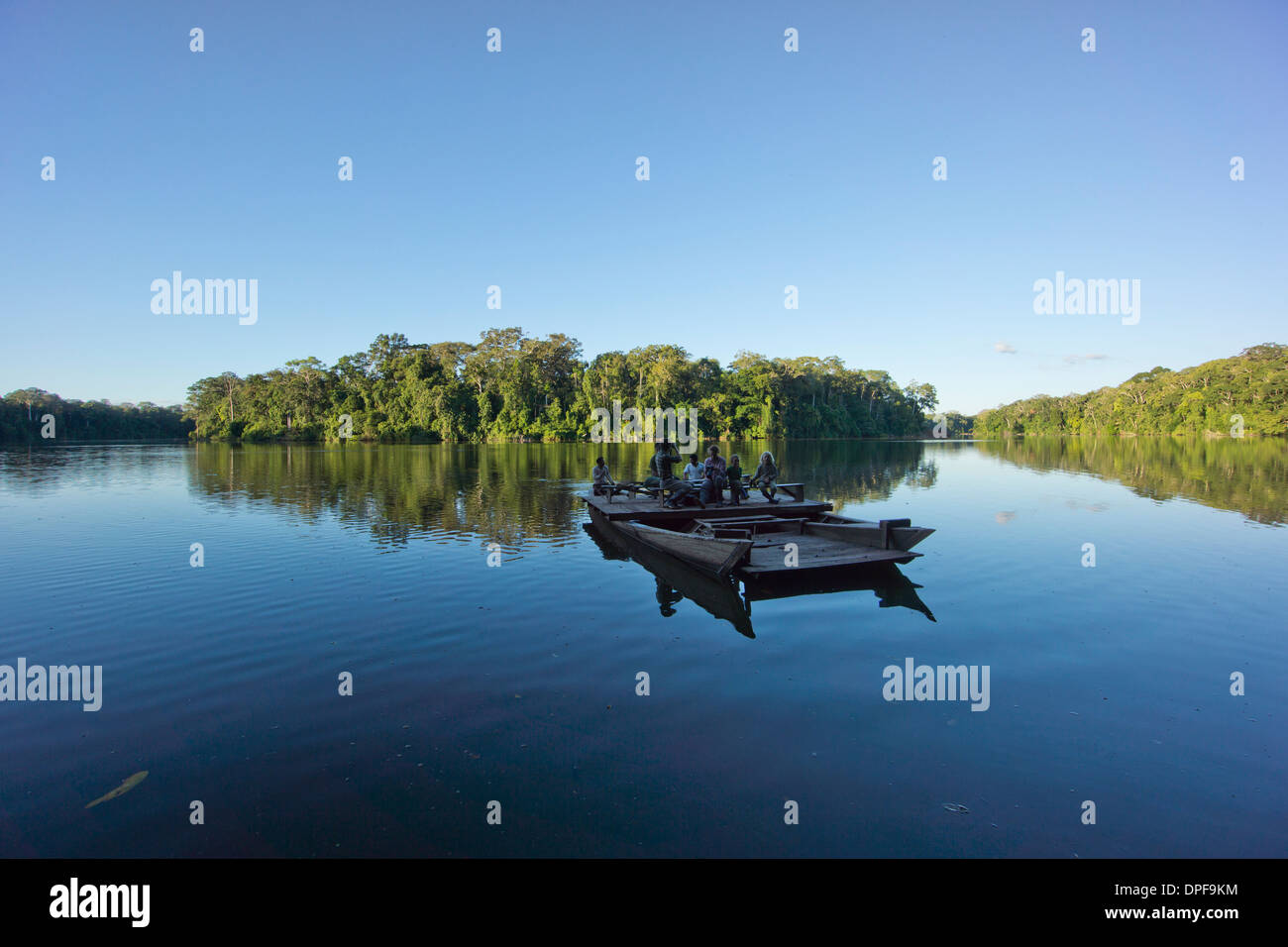 Tourist boat on Lake Salvador, Manu National Park, UNESCO World ...