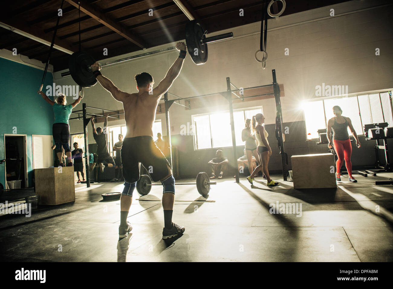 Group of people training in gymnasium Stock Photo - Alamy