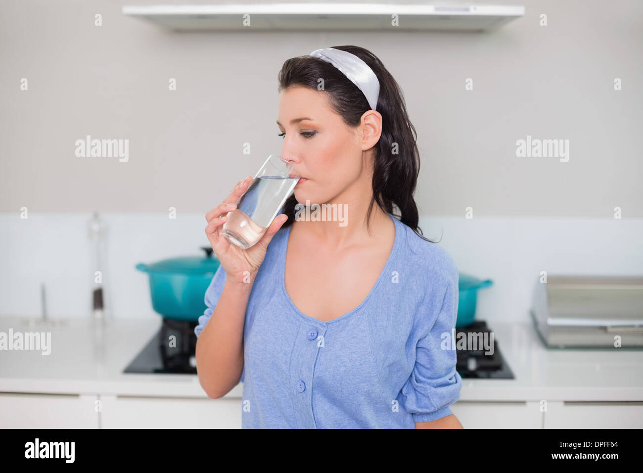 Content gorgeous model drinking water Stock Photo - Alamy