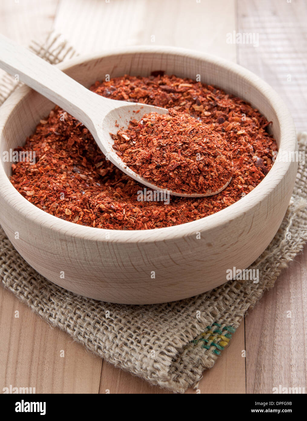 ground red cayenne pepper in wooden bowl, close up Stock Photo - Alamy