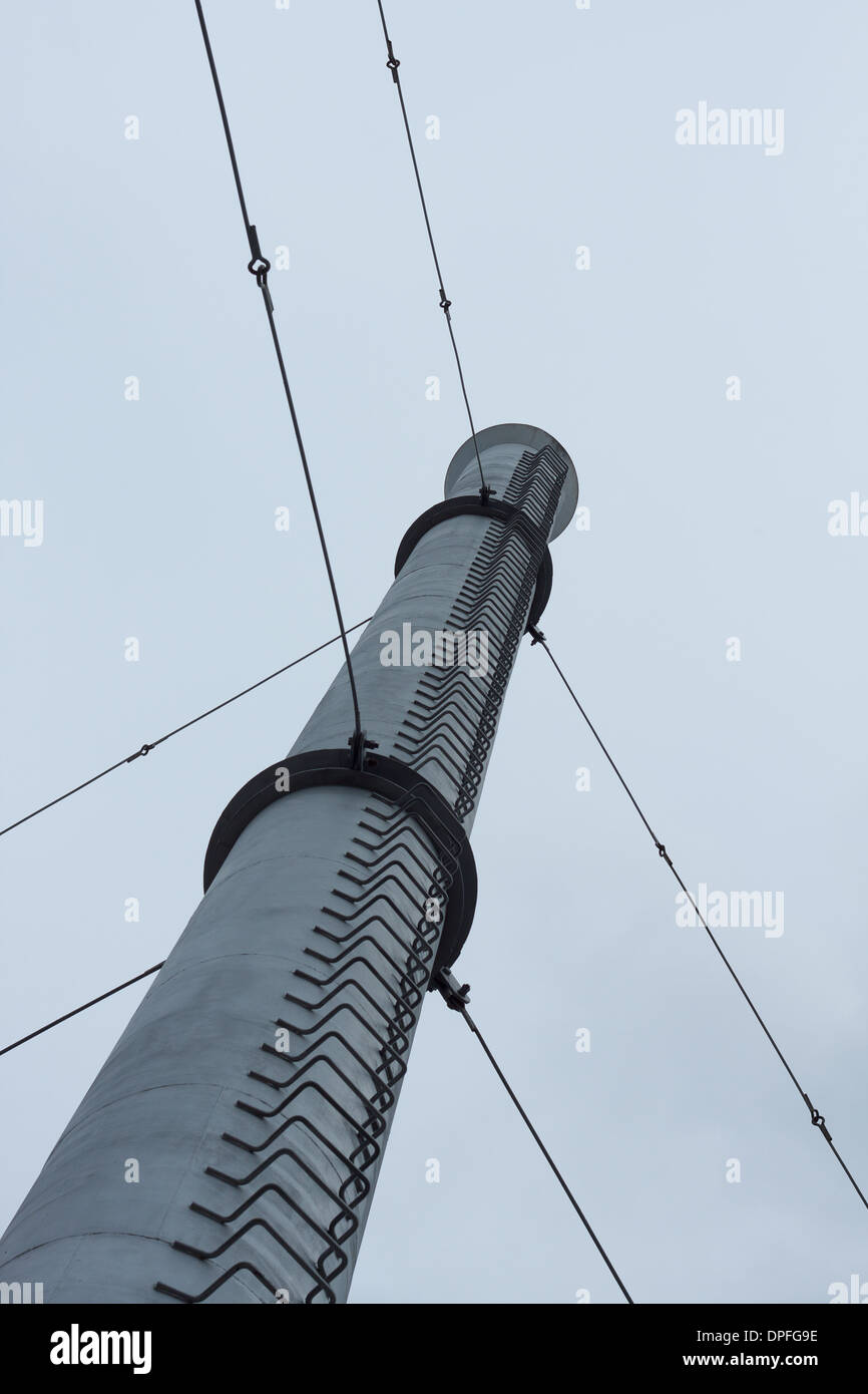 Industrial metal pipe with a ladder against the sky Stock Photo - Alamy