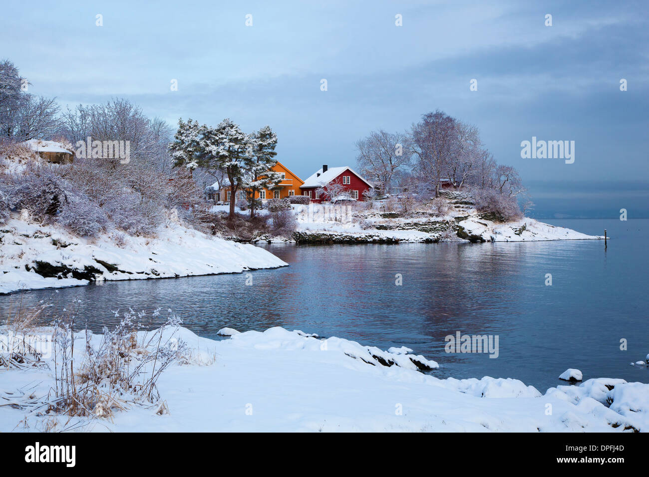 Norwegian winter fjord landscape with colorful houses Stock Photo - Alamy