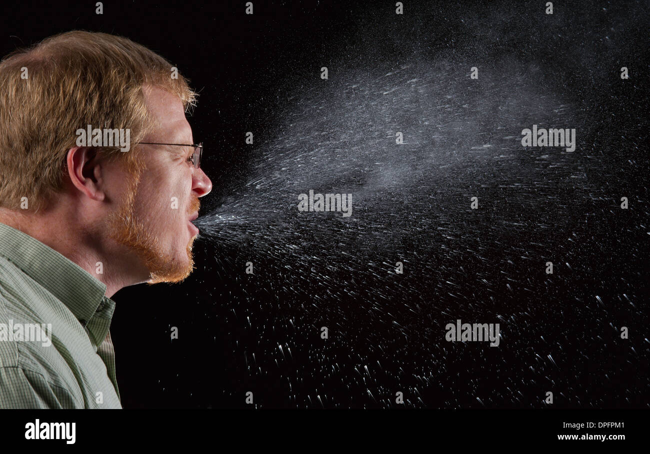 Photograph capturing a sneeze in progress Stock Photo - Alamy