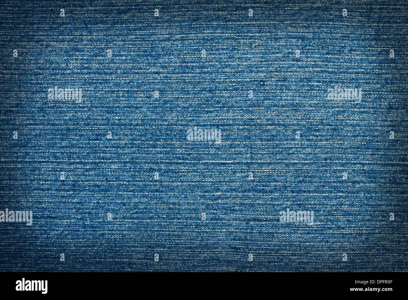 Rough denim blue background with dark contour Stock Photo - Alamy