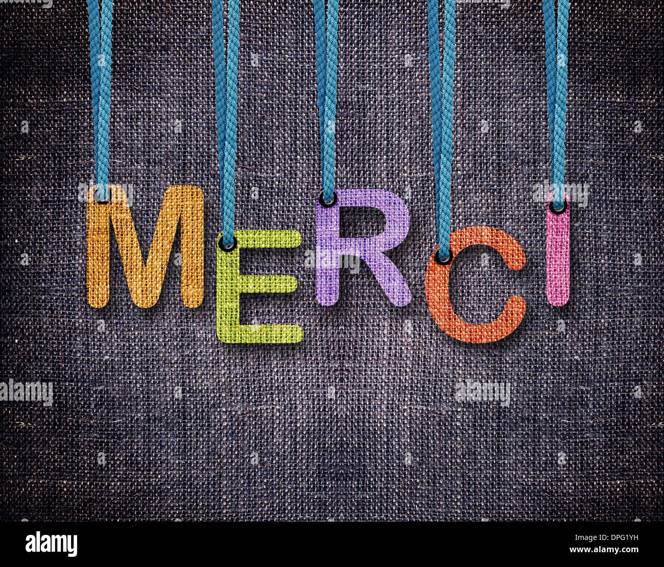 Merci Letters hanging strings with blue sackcloth background Stock ...