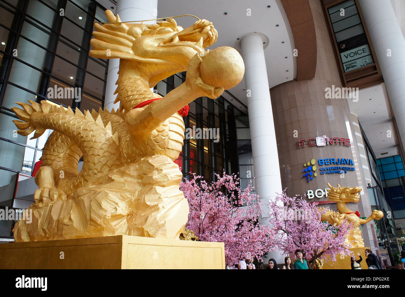 dragon statue at entrance of building Stock Photo - Alamy
