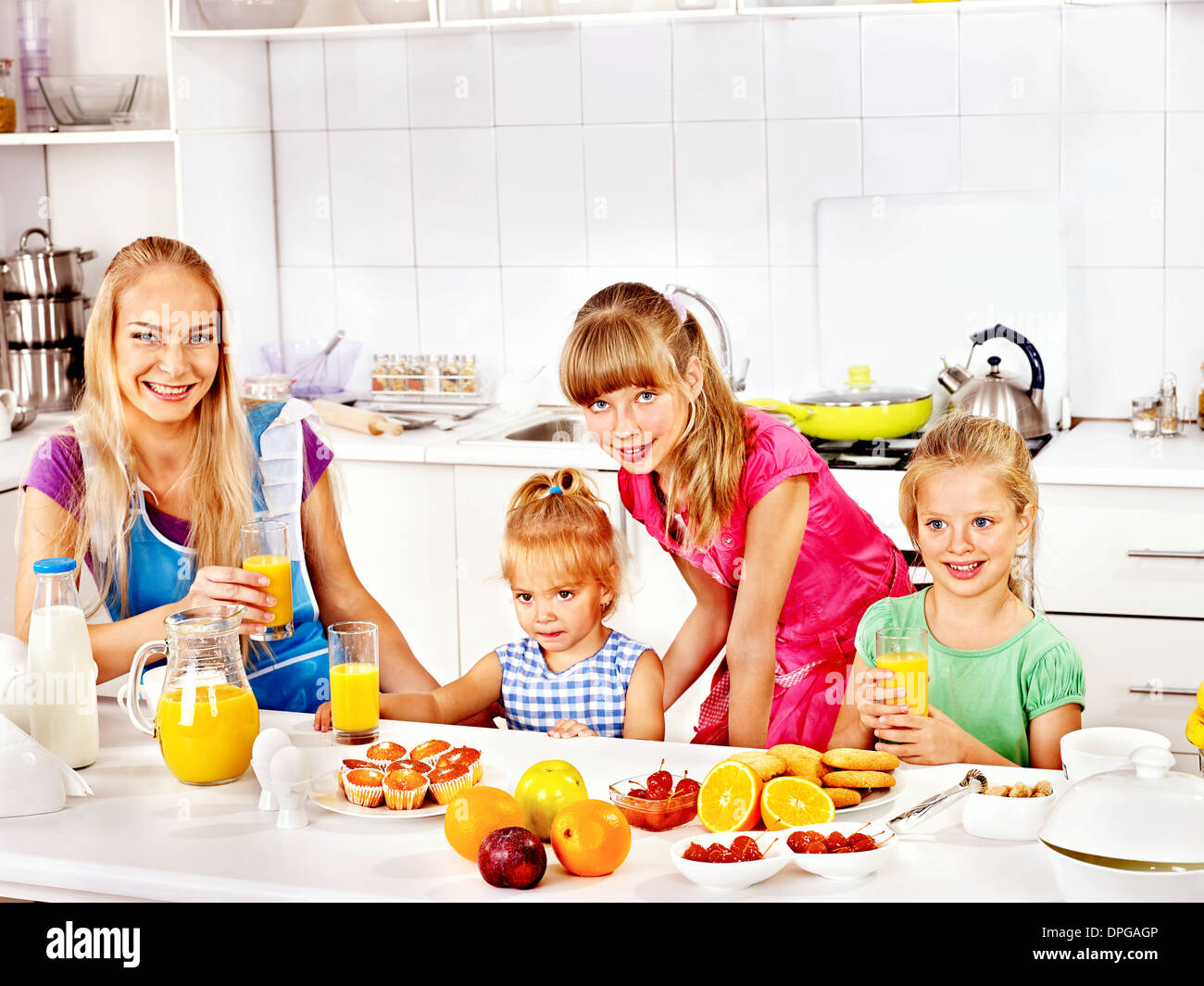 Family breakfast with child at kitchen Stock Photo - Alamy