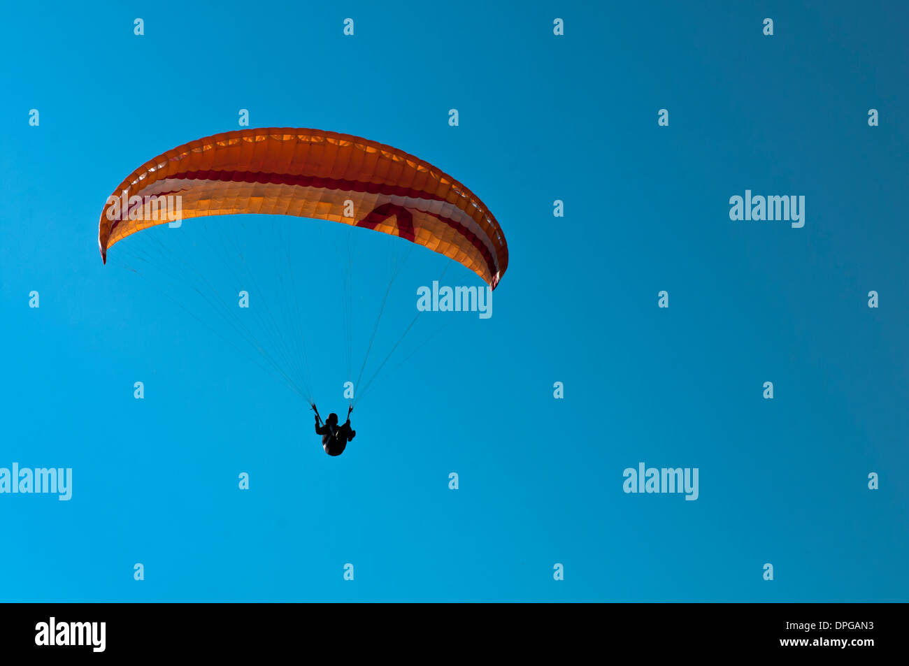 Paraglider on landing approach Stock Photo - Alamy
