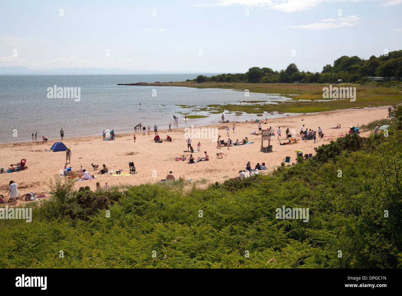Sandyhills beach with holidaymakers enjoying the sunshine, Dumfries ...