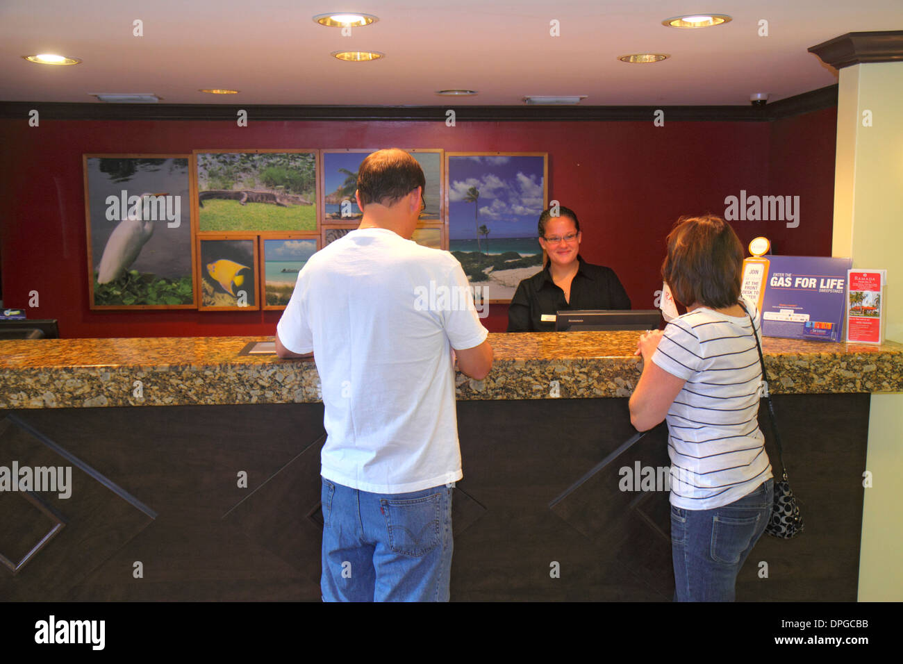 Reception guests check in hotel High Resolution Stock Photography and ...