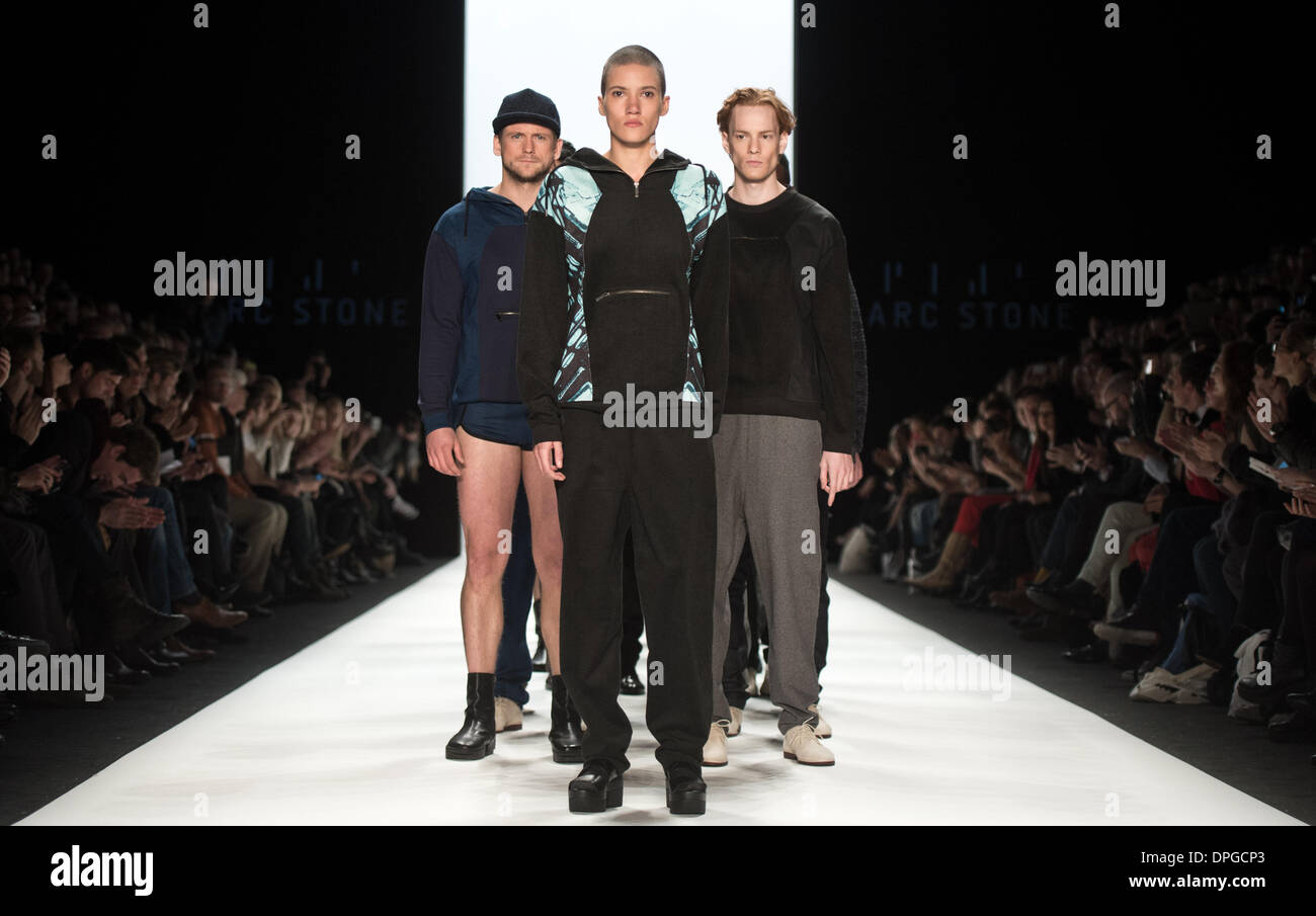 Berlin, Germany. 14th Jan, 2014. Models present a creation at the Marc ...