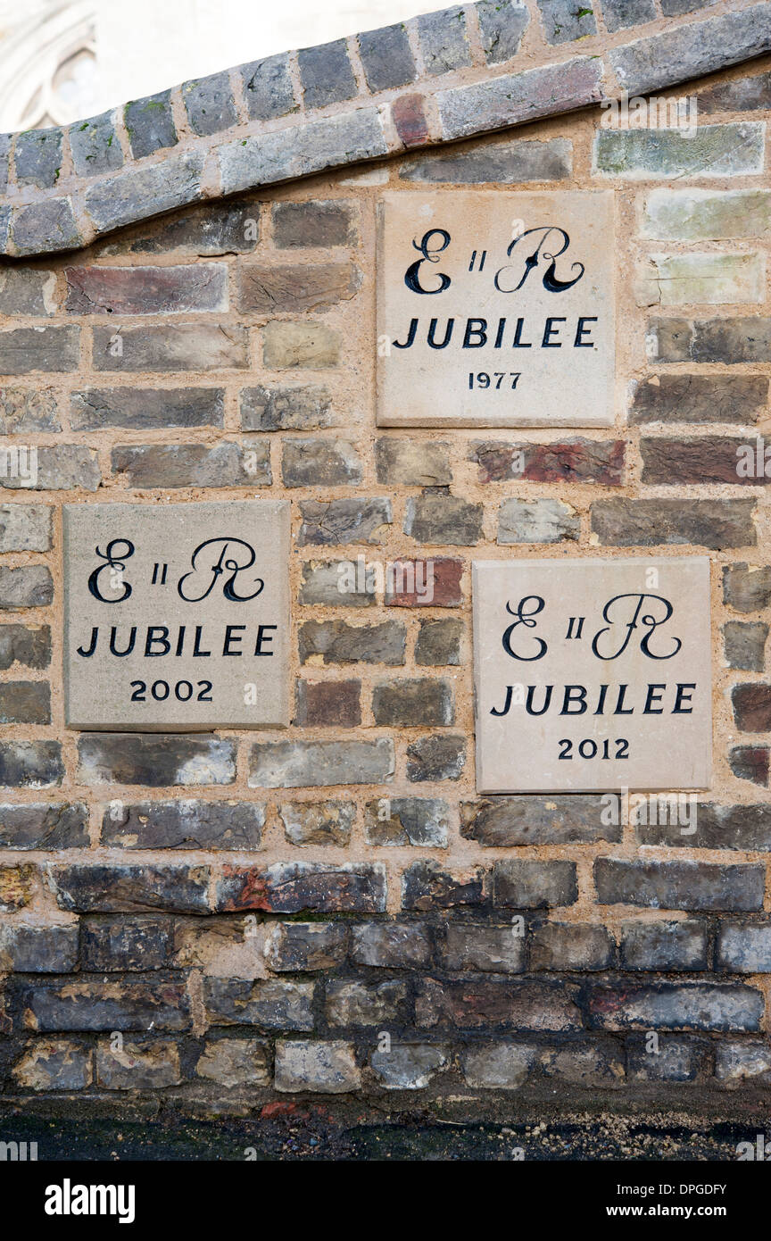 Masonry plaques in a wall in Willingham Cambridgeshire to commemorate ...