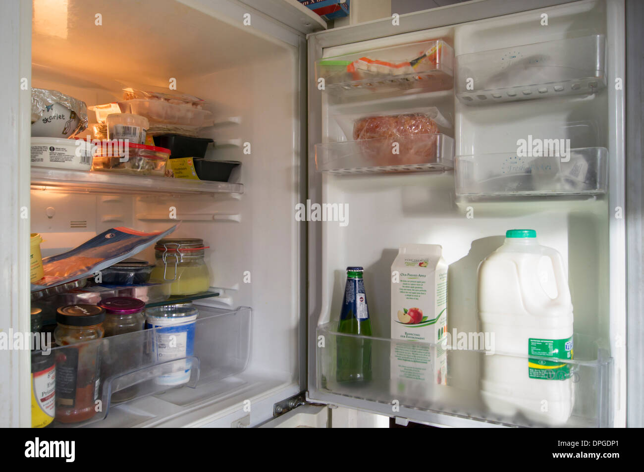 Open door refrigerator full food hi-res stock photography and images ...