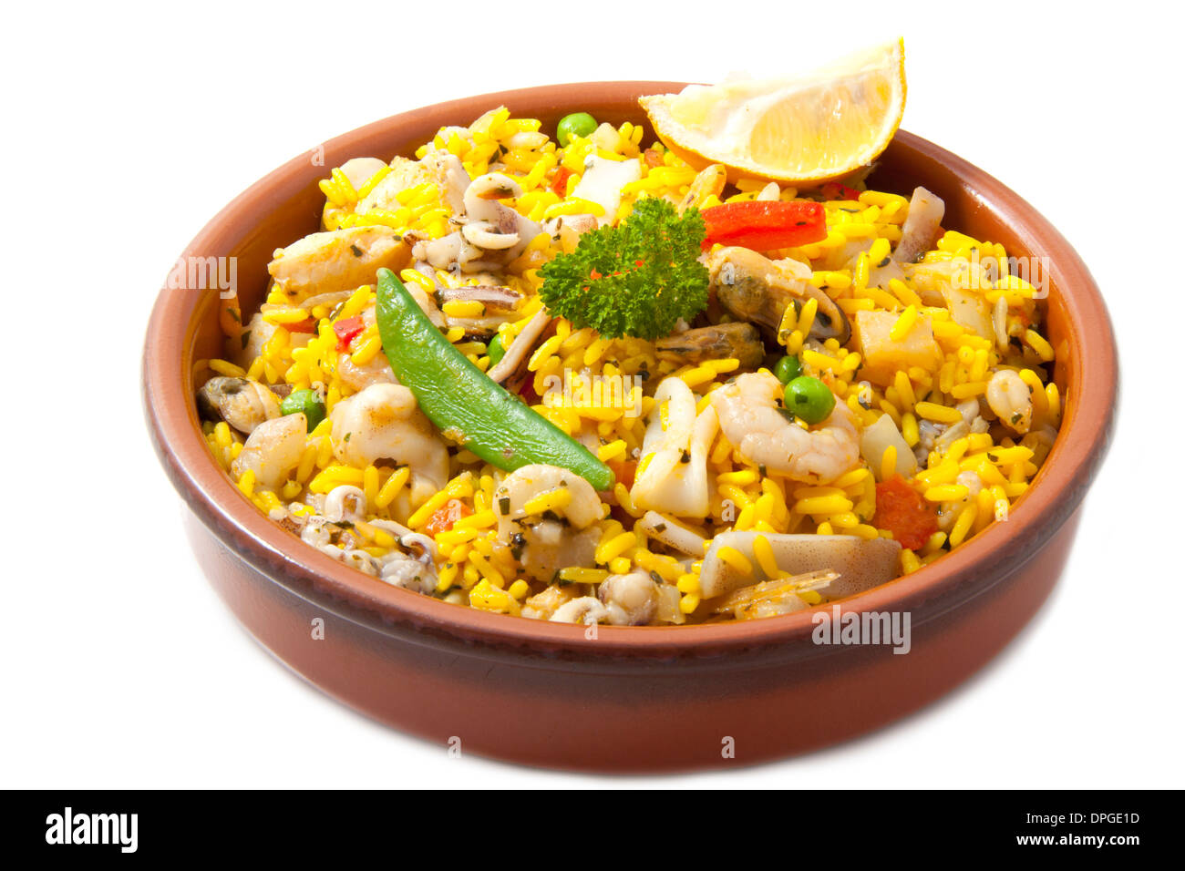 Ceramic plate with paella isolated on a white background Stock Photo ...