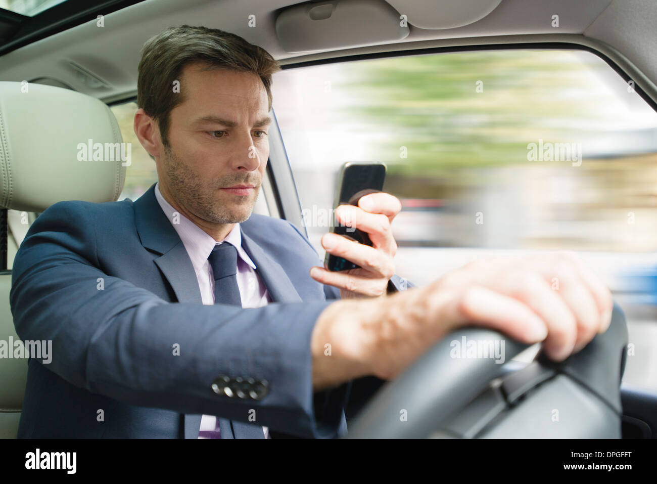 Focus on phones in the car hi-res stock photography and images - Alamy