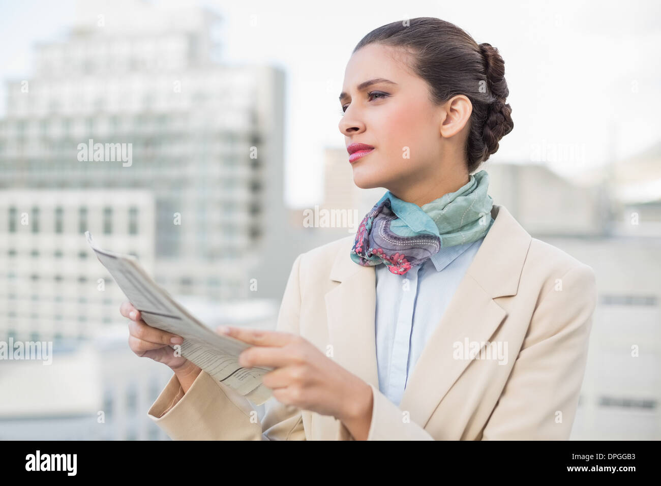 Smart young woman thinking hi-res stock photography and images - Alamy
