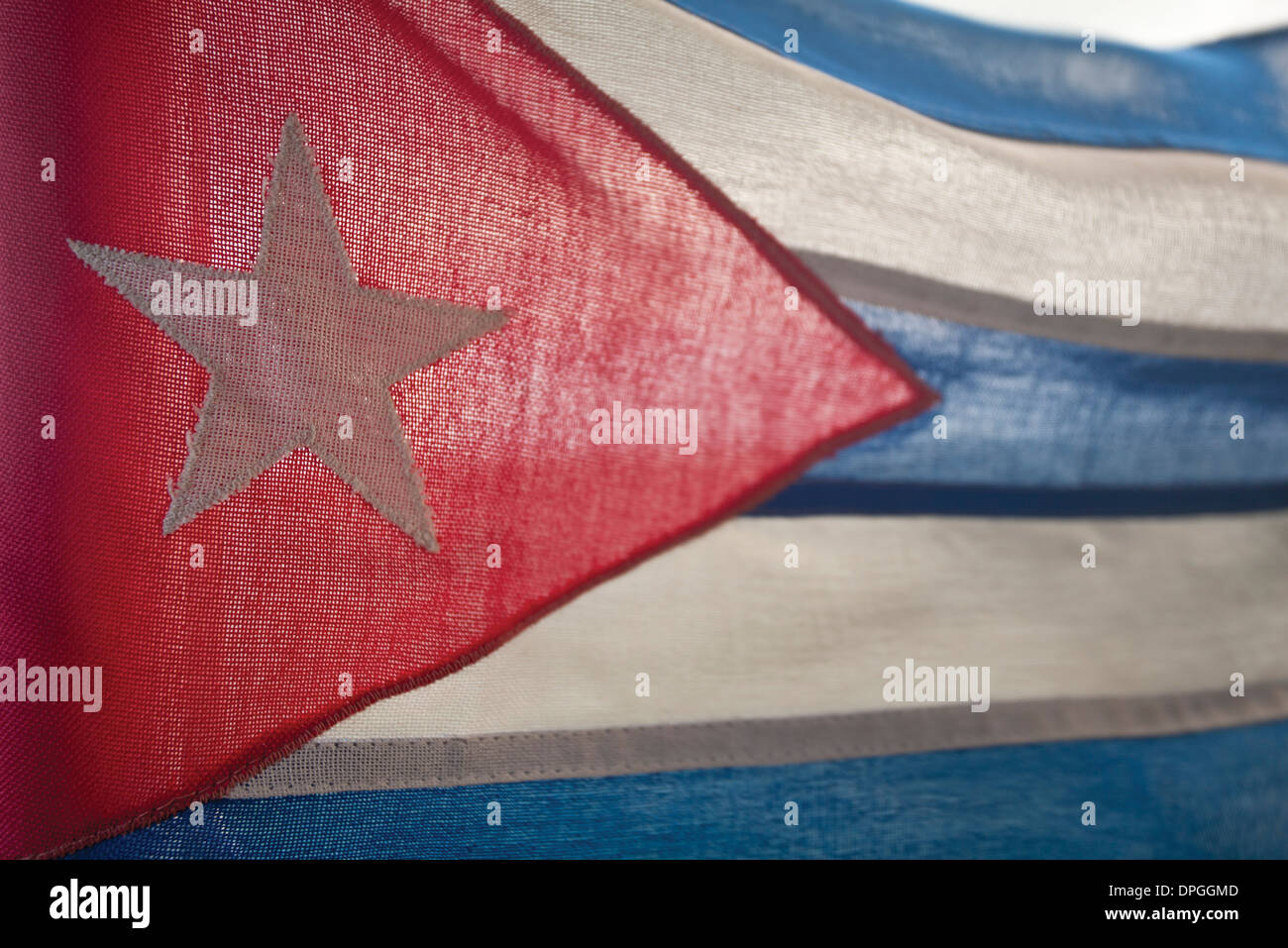 Light shining through Cuban flag, full frame Stock Photo - Alamy