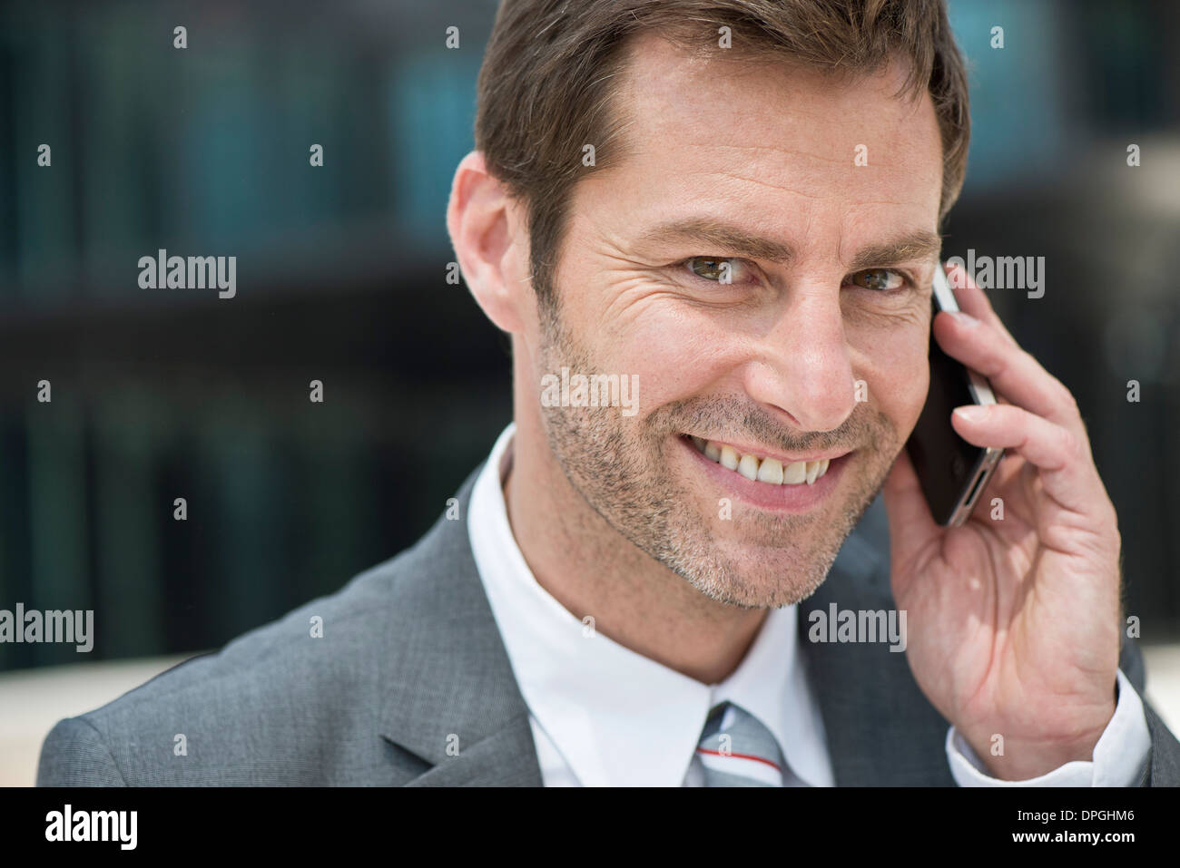 Businessman making phone call Stock Photo - Alamy