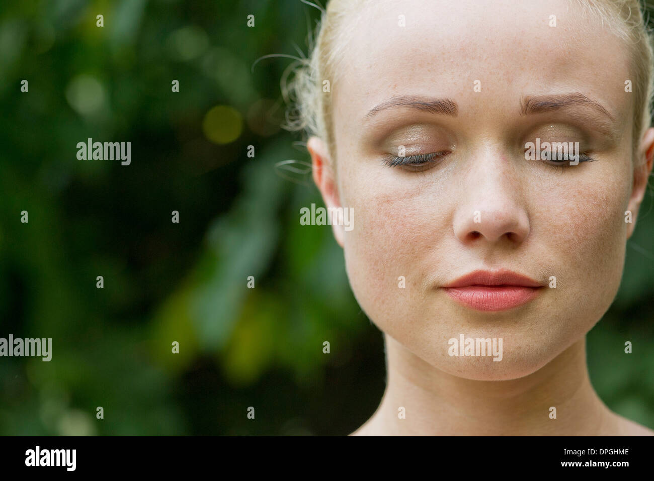 Meditating woman front face hi-res stock photography and images - Alamy