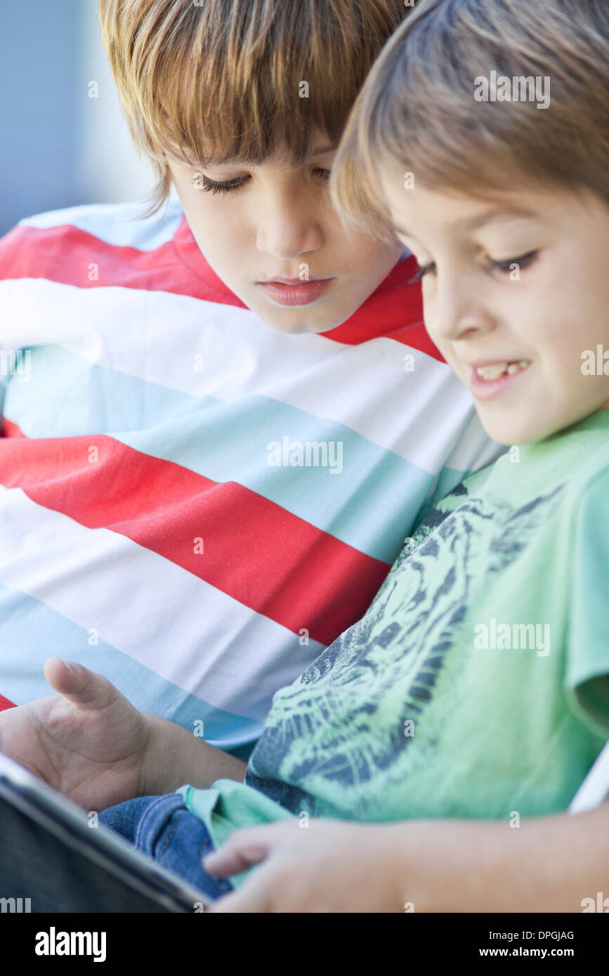Kindle reader boy hi-res stock photography and images - Alamy
