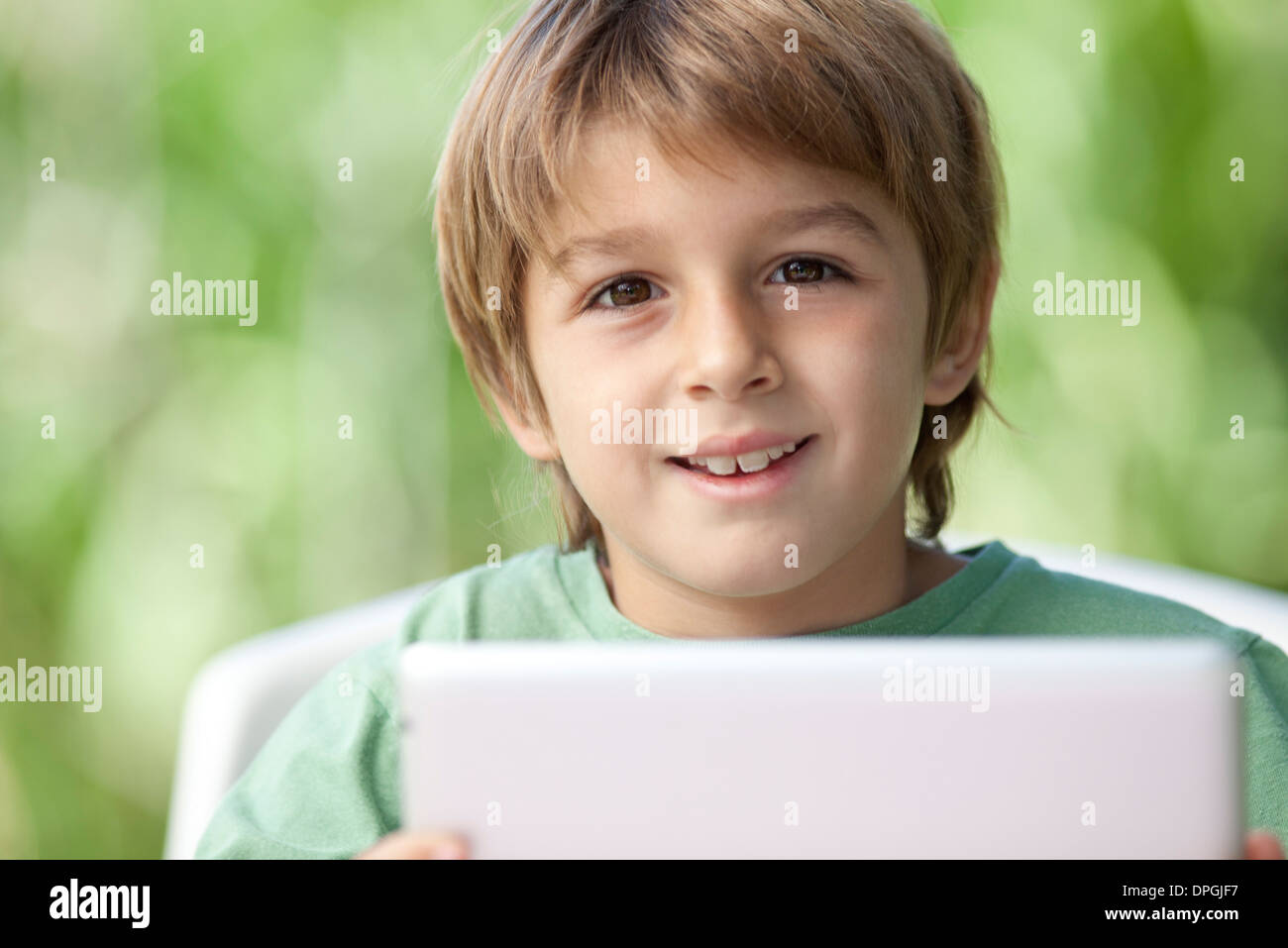 Holding ipad with children hi-res stock photography and images - Alamy