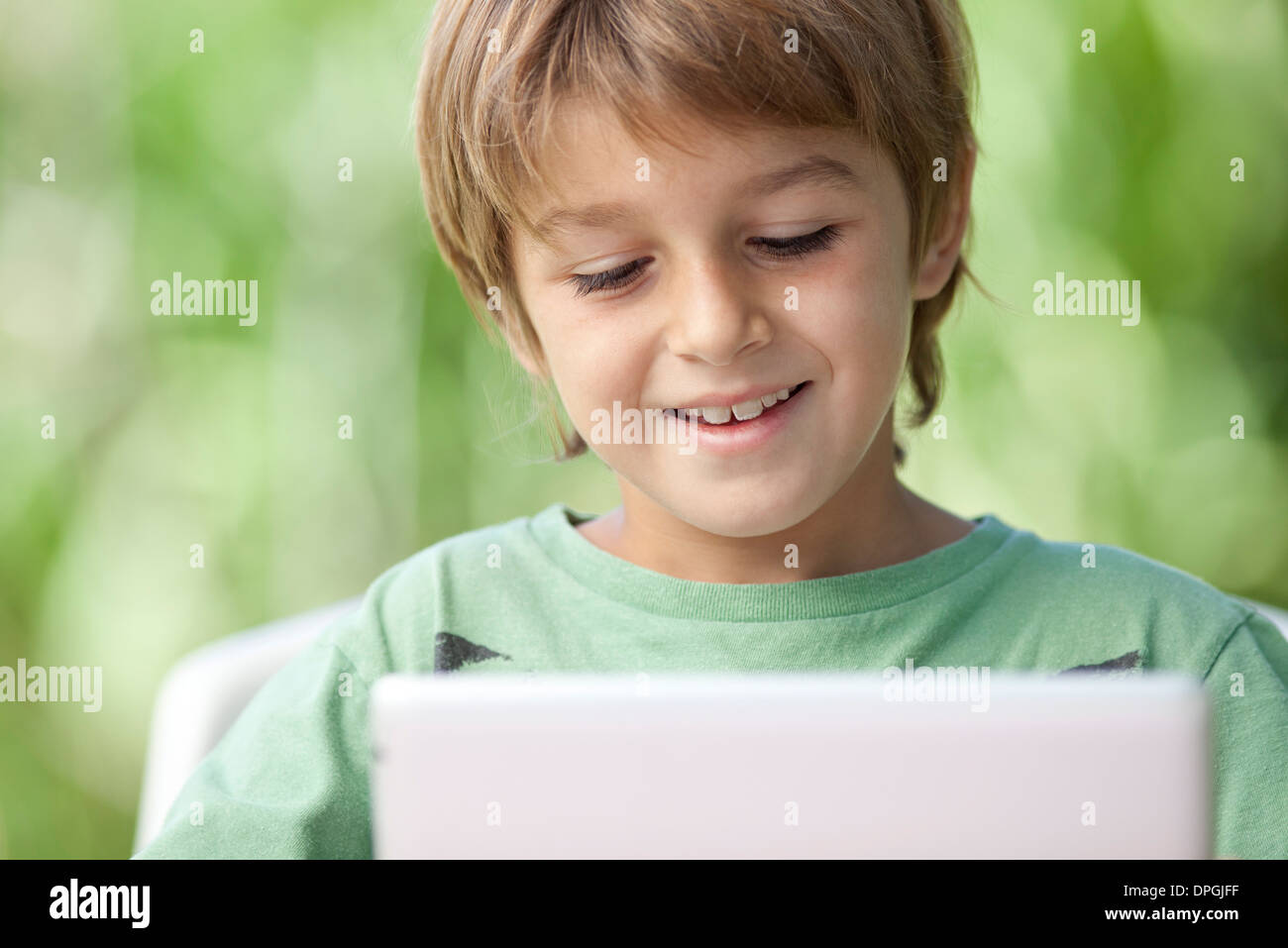 Kindle reader boy hi-res stock photography and images - Alamy
