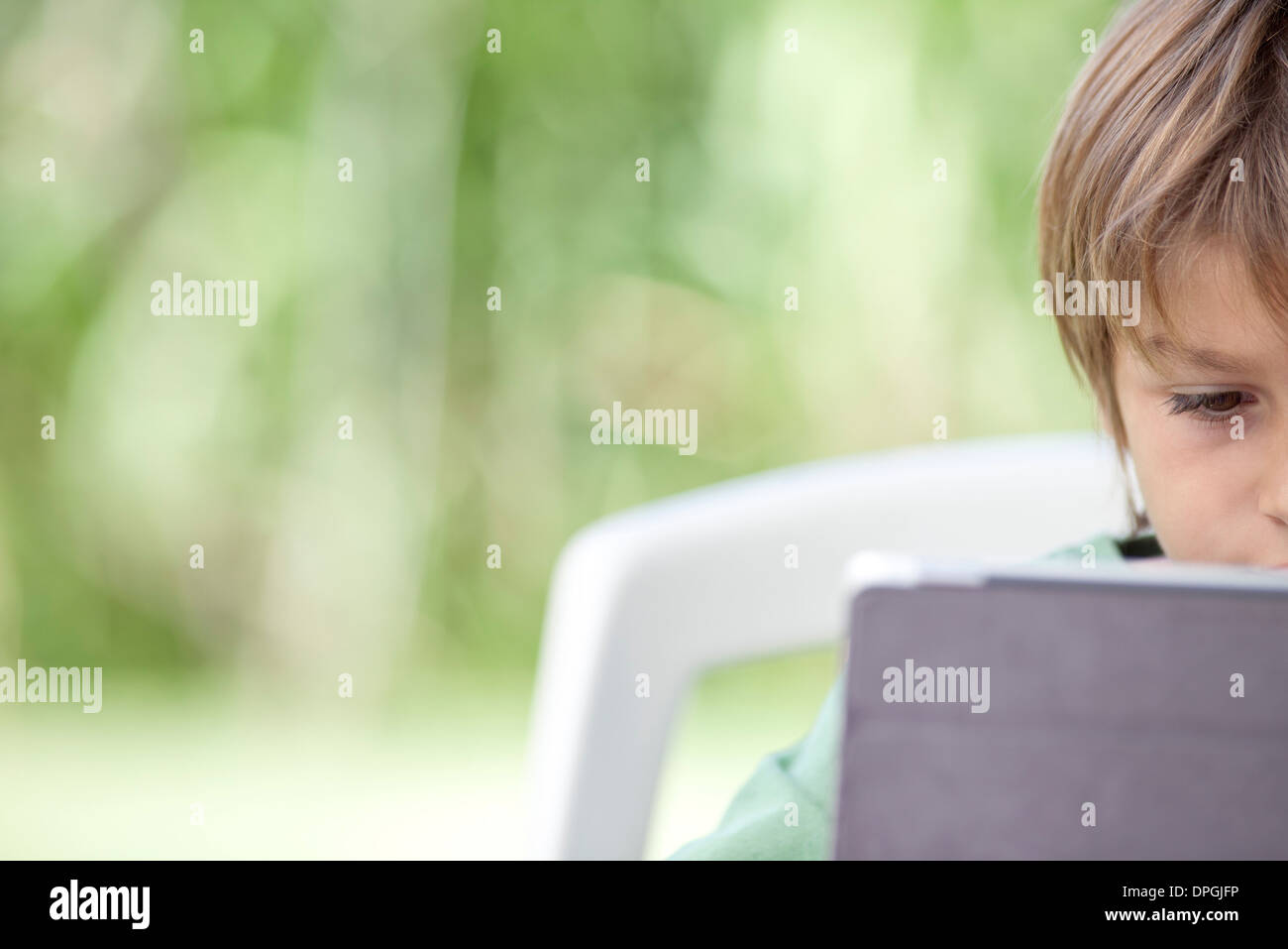 Kindle reader boy hi-res stock photography and images - Alamy