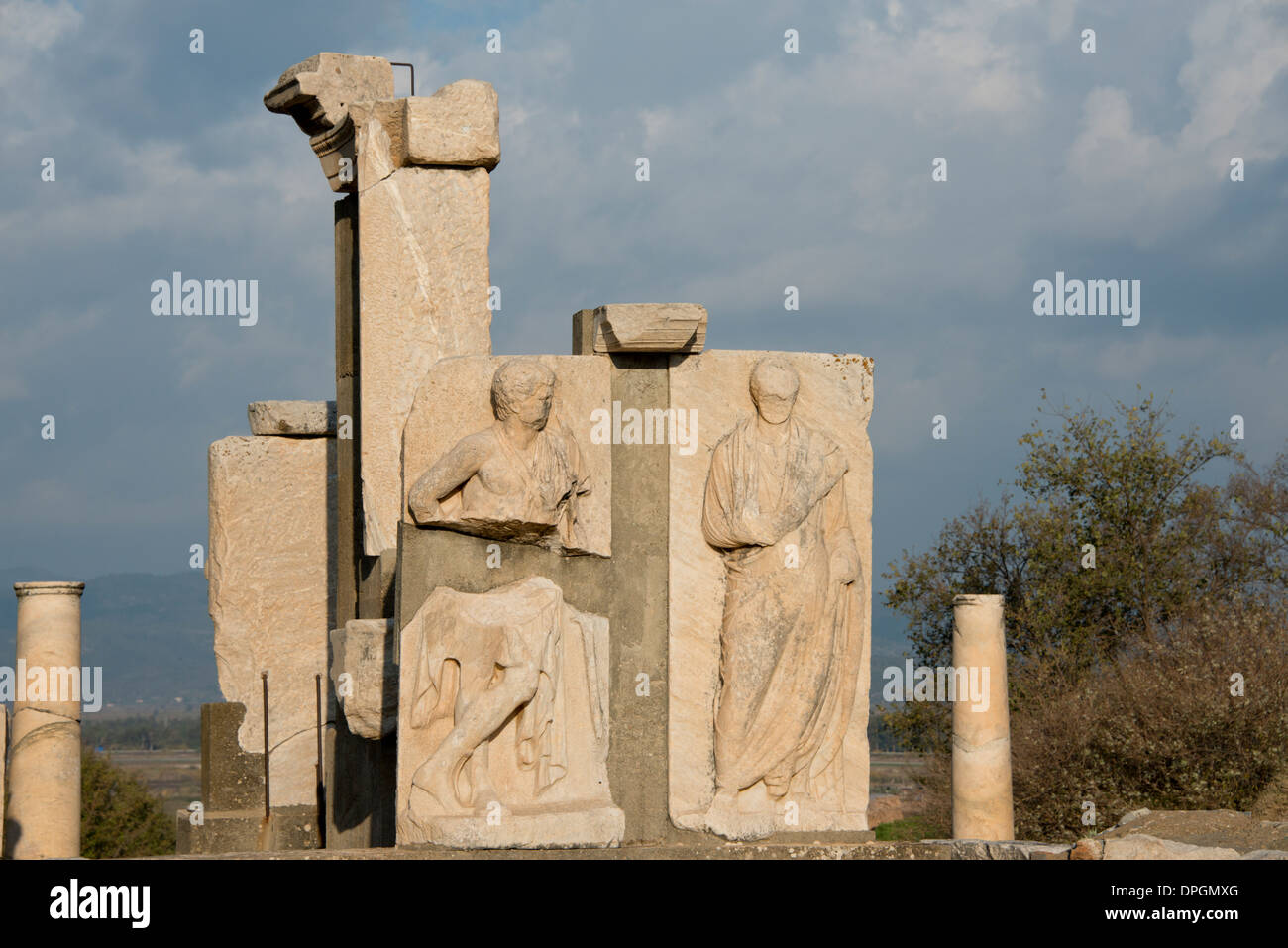 Turkey, Kusadasi, Ephesus. Ancient ruins, columns, and carved statues ...