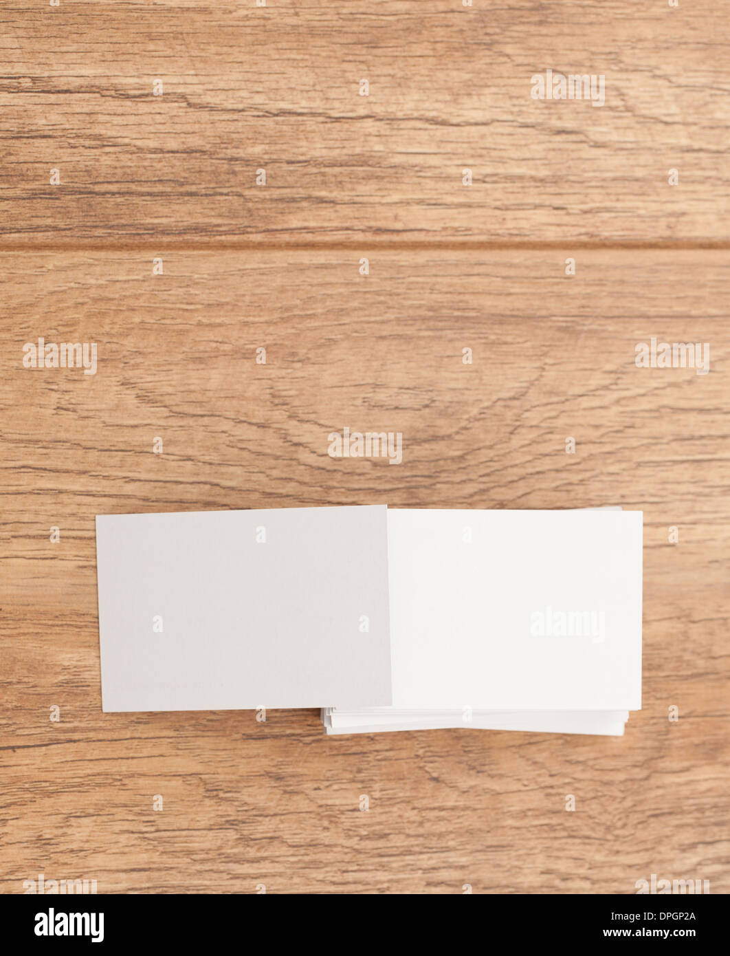 Business card pile on desk Stock Photo - Alamy